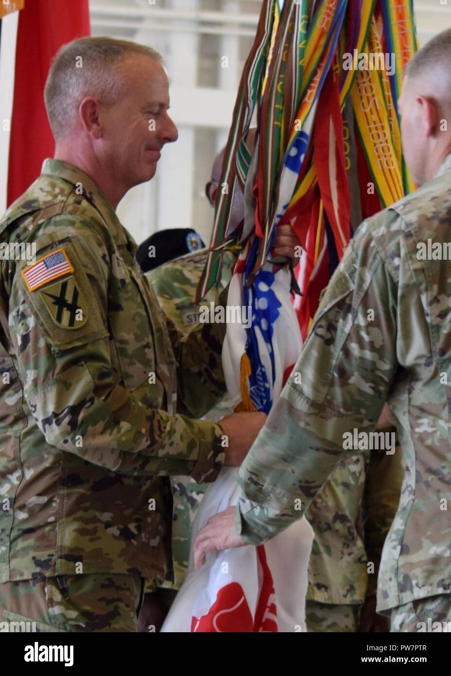 Colonel Randall Simmons, incoming commander of the Ga. ARNG accepts the ...