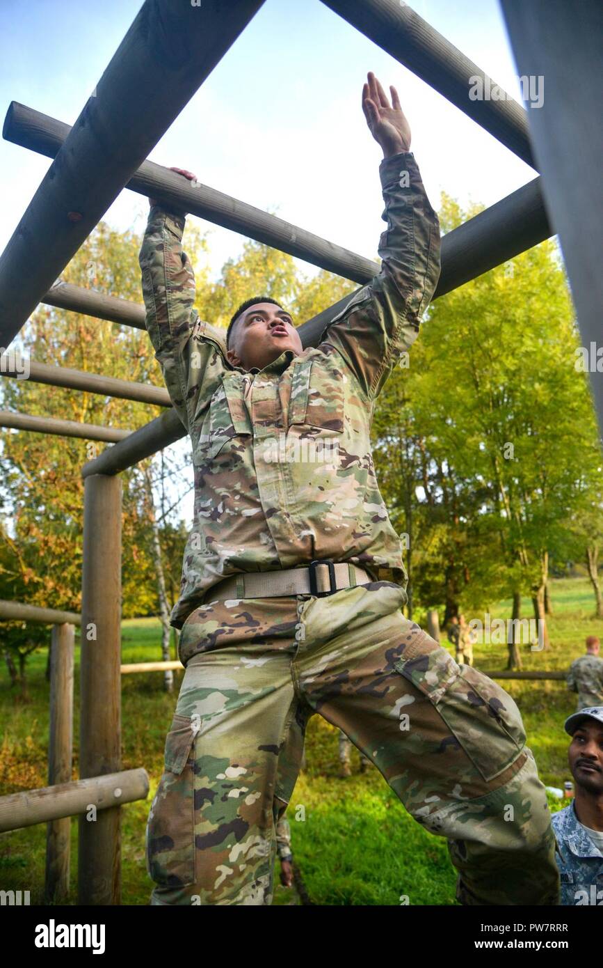 SGT Susi Stuttgart Army Medical Clinic negotiates the Tarzan obstacle ...