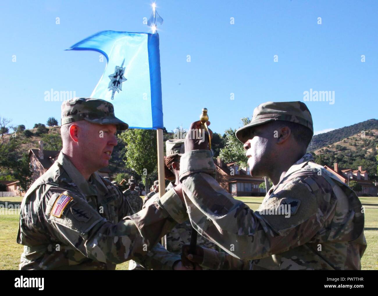 The outgoing First Sergeant, First Sgt. Julius Eldridge, passes the NCO ...