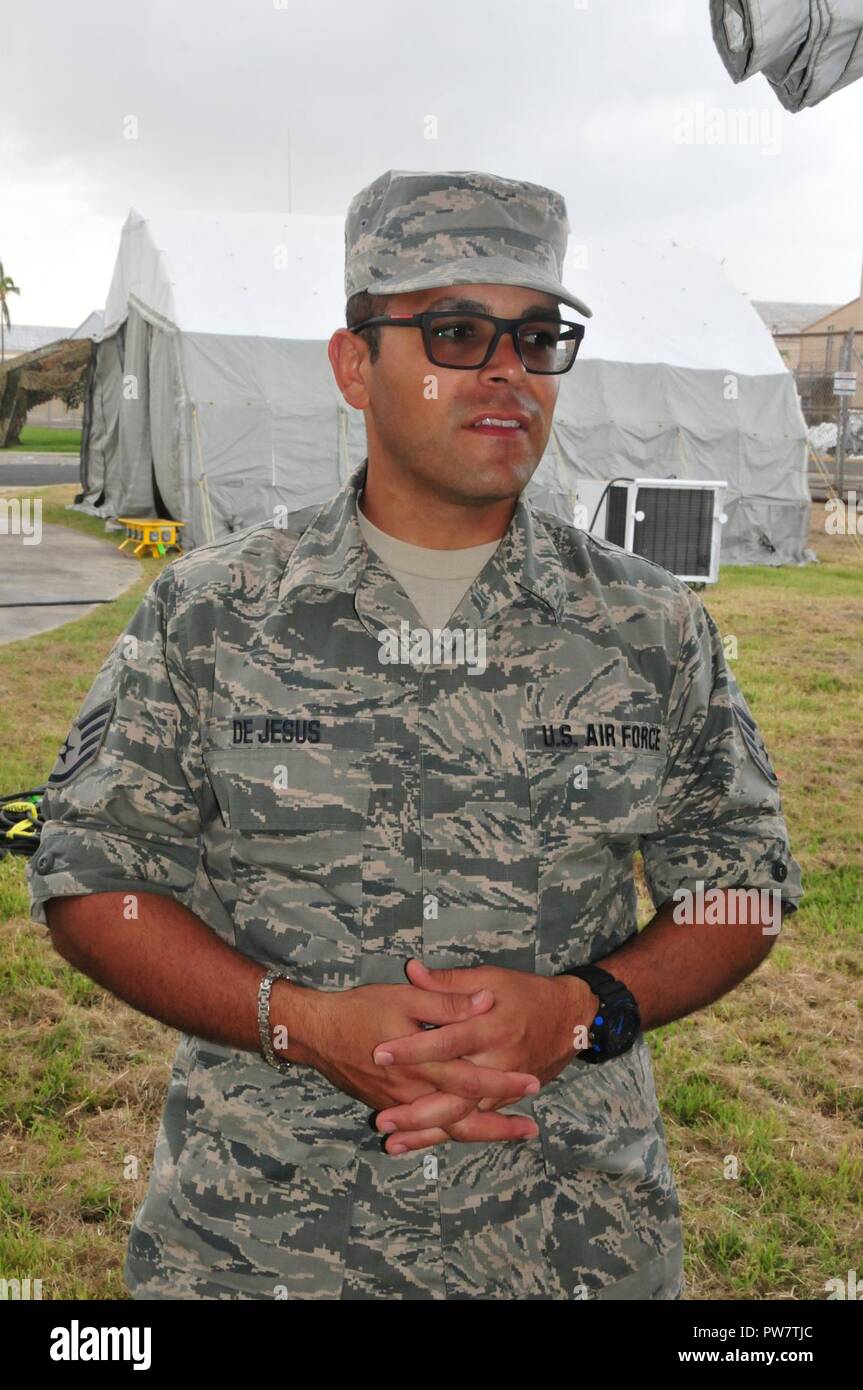 SSgt. Hector de Jesus stands in front of the triage tents he helped ...