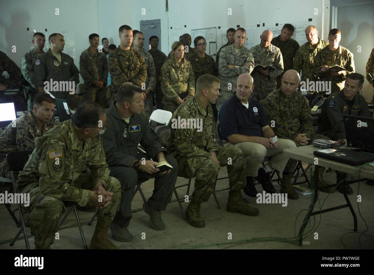 U.S. Army Lt. Gen. Jeff Buchanan, center, commander of U.S. Army North ...