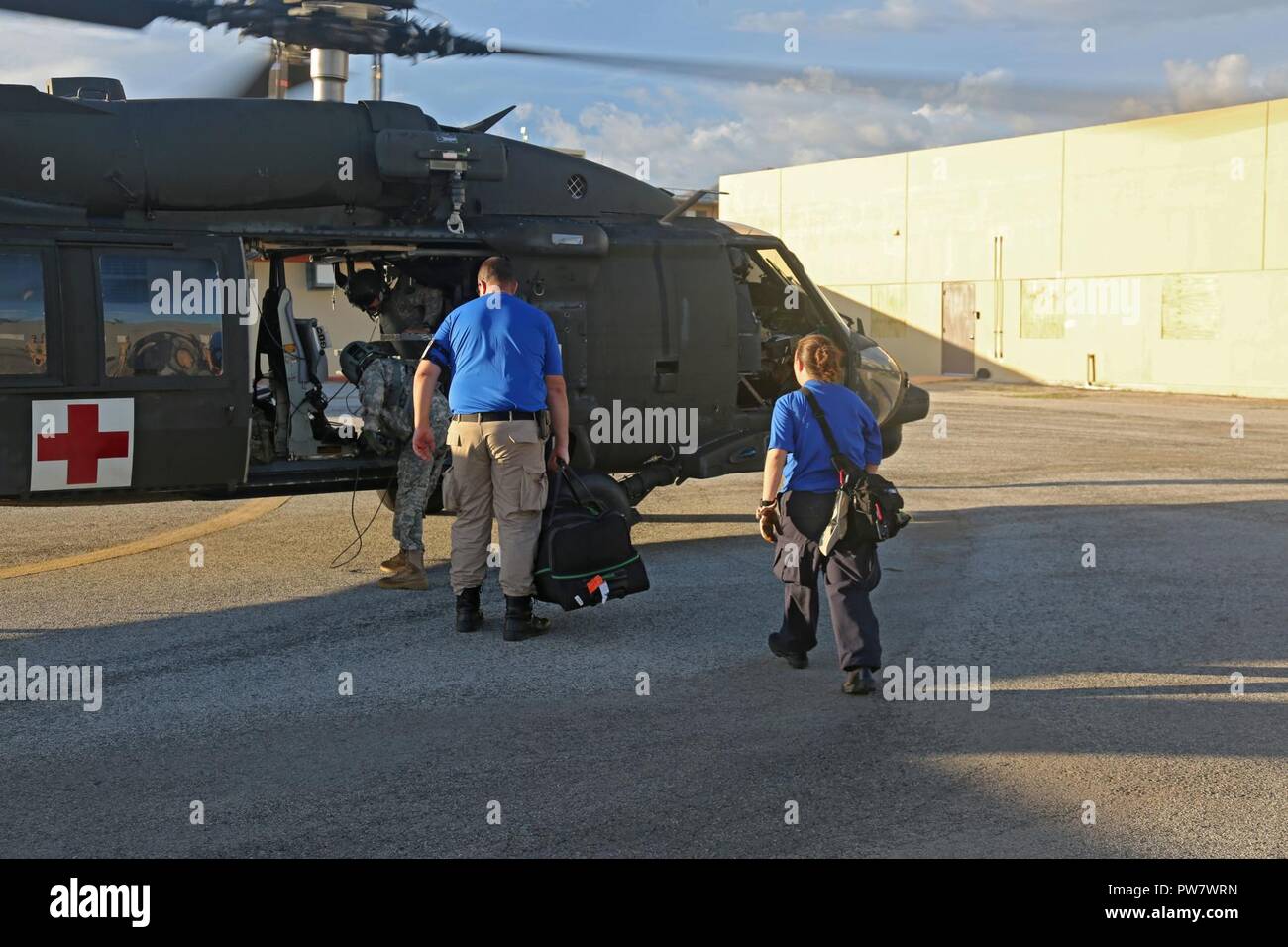 Disaster Medical Assistance Teams (DMAT), prepare to unload bags and ...