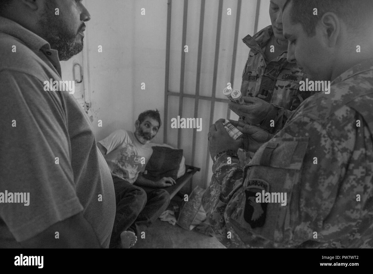 U.S. Army Cpt. Benjamin Stork (right), Flight Surgeon, and Sgt. Luis ...