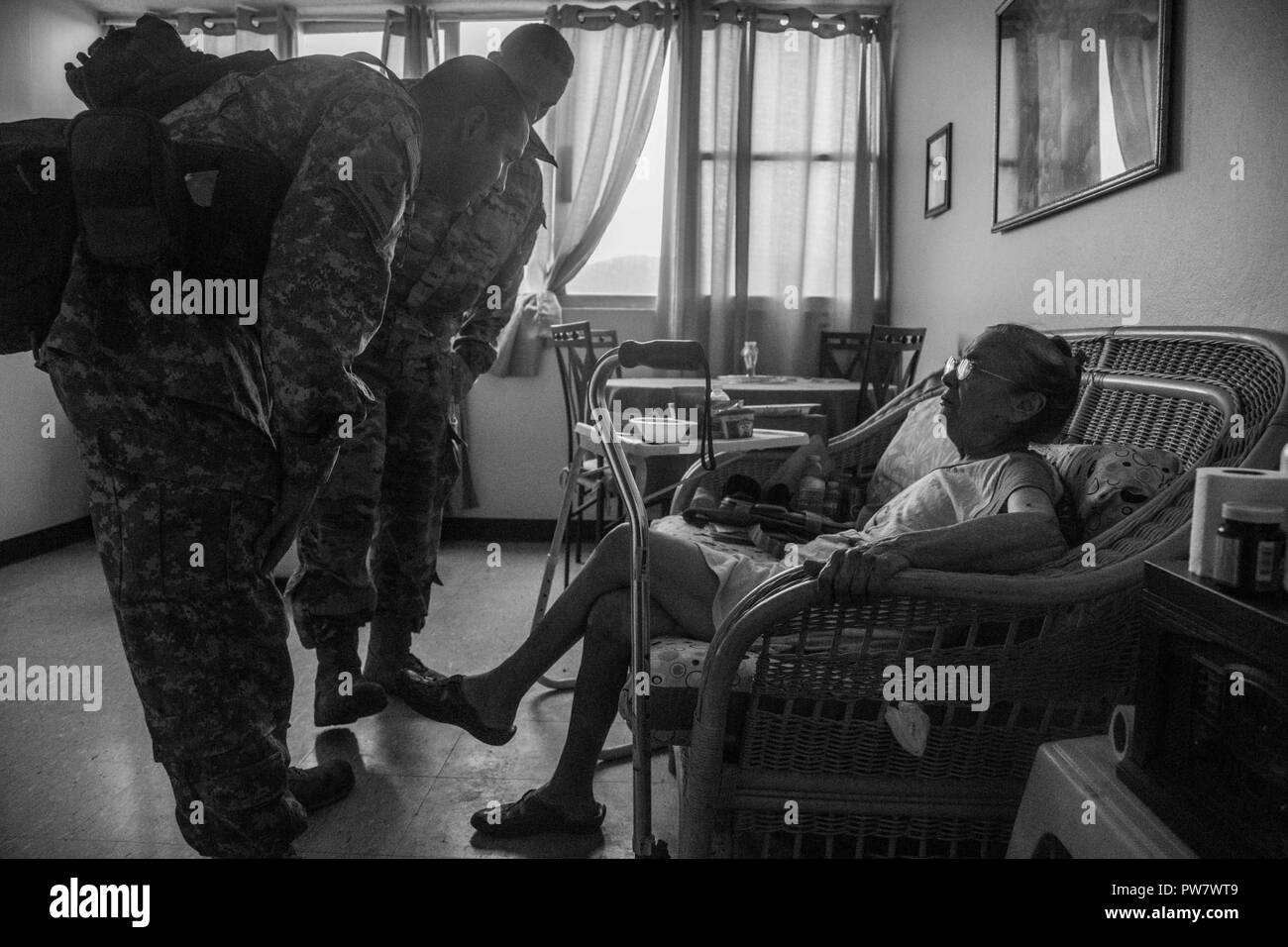 U.S. Army Sgt. Luis Rodriguez (front left), Flight Medic, and Cpt ...