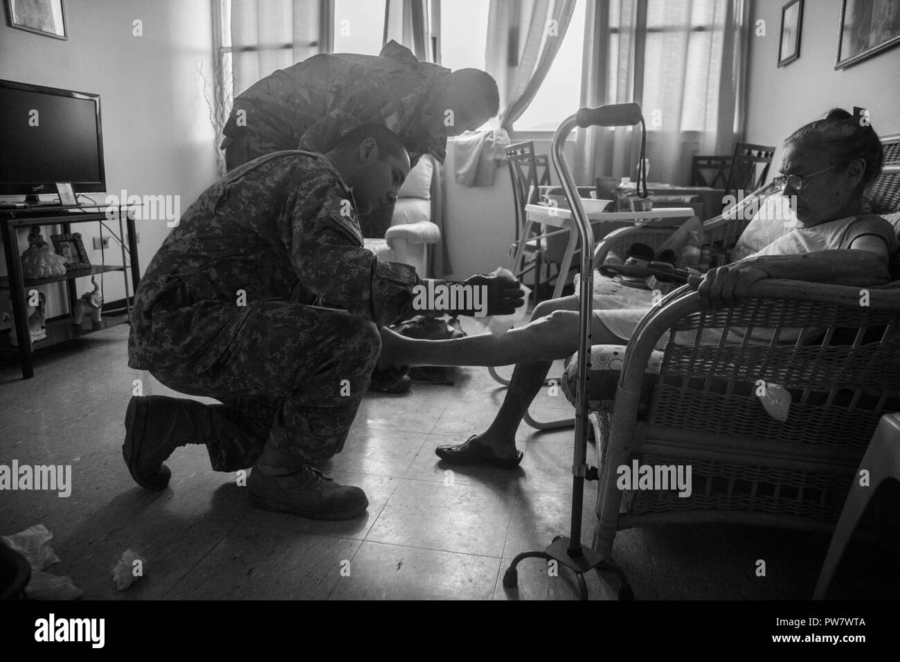 U.S. Army Sgt. Luis Rodriguez, left, a flight medic, and Capt. Benjamin ...