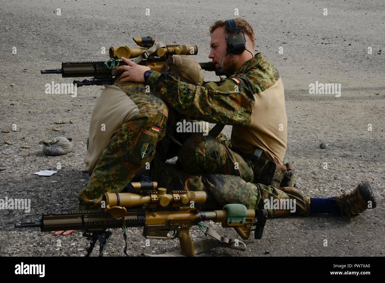 A German sniper team engages targets during the European Best Sniper ...