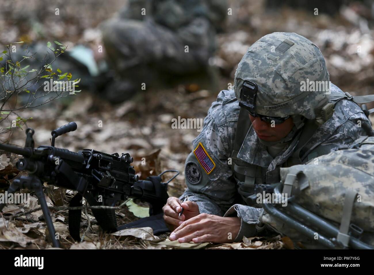 U.S. Army Soldiers draw up sector maps while on a field training ...