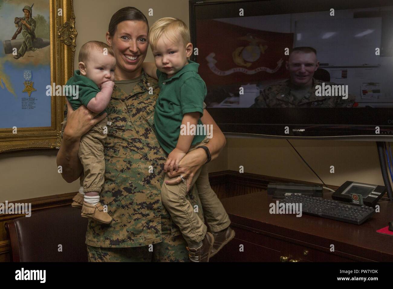 U.S. Marine Corps Lt. Col. Sarah B. Lenz poses with her family ...
