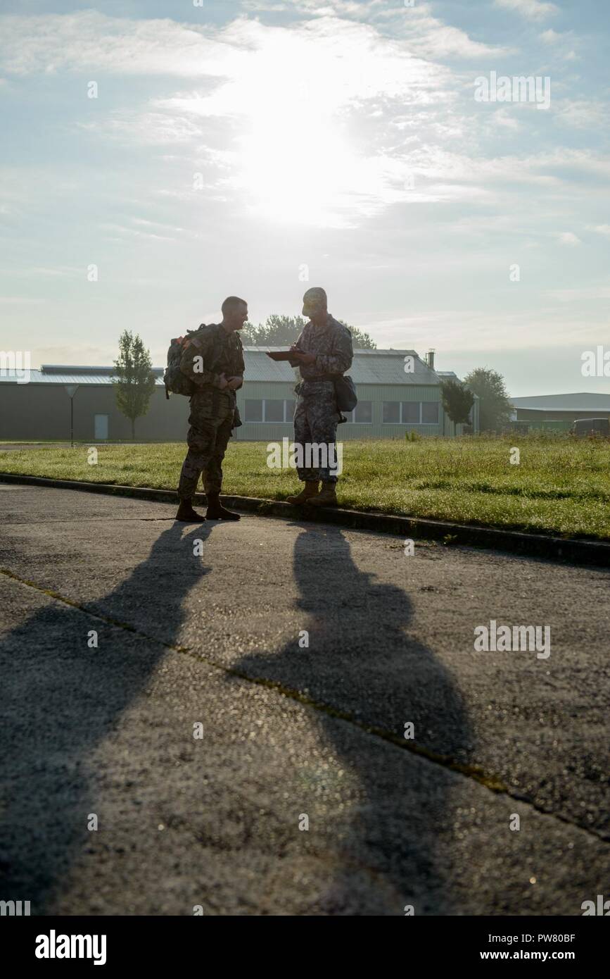 U.S. Army Cpl. Zachery Frederick, reports to Staff Sgt. Michael Daye ...