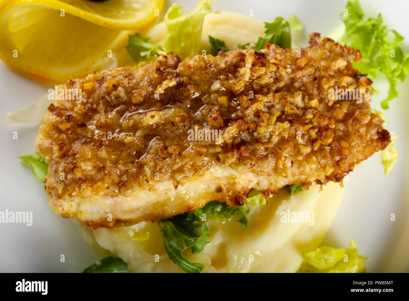 Baked Cod fish with mashed potato Stock Photo - Alamy