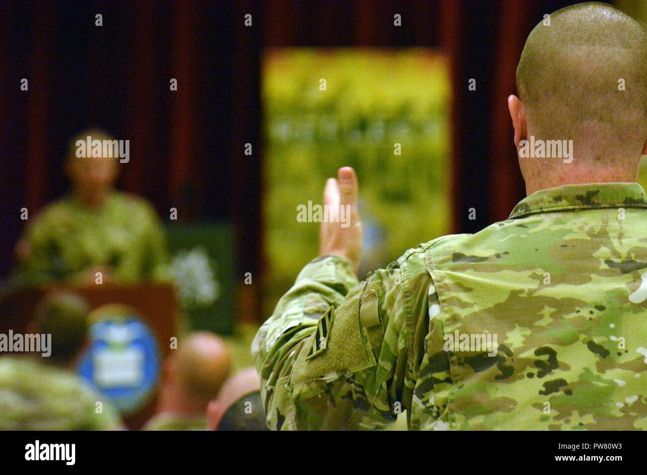 A chaplain asks Lt. Col. Kenneth Dwyer, garrison commander, Hunter Army ...