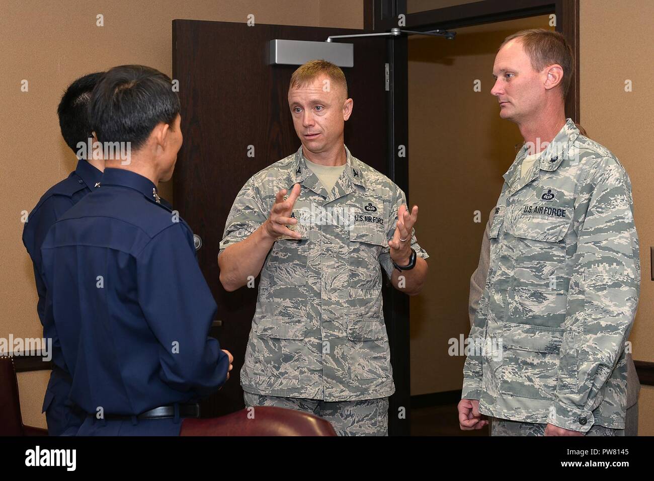 Col. Jason Patla (center), 2nd Weather Group commander, and Lt. Col ...