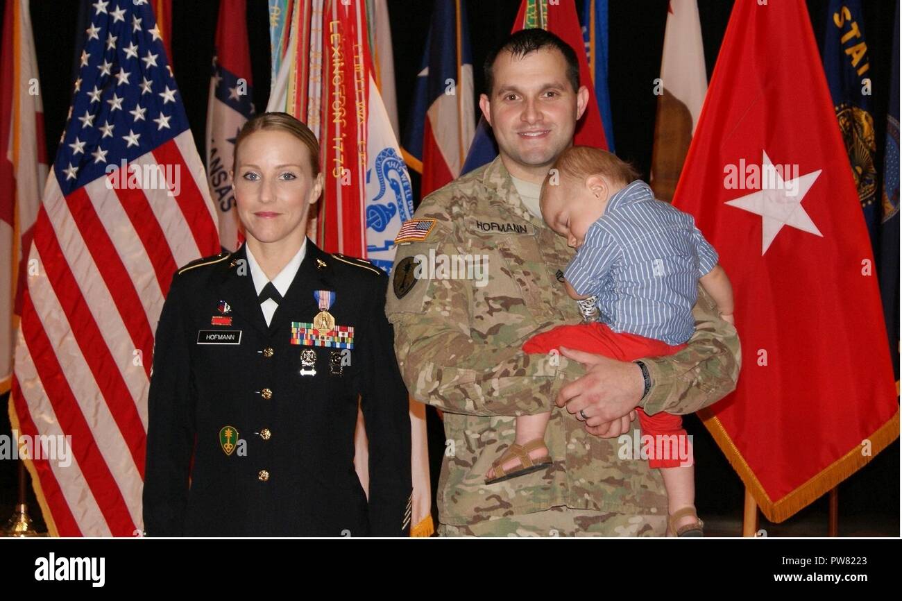 (Left to right) Sgt. 1st Class Alicia Hofmann, her husband Staff Sgt ...