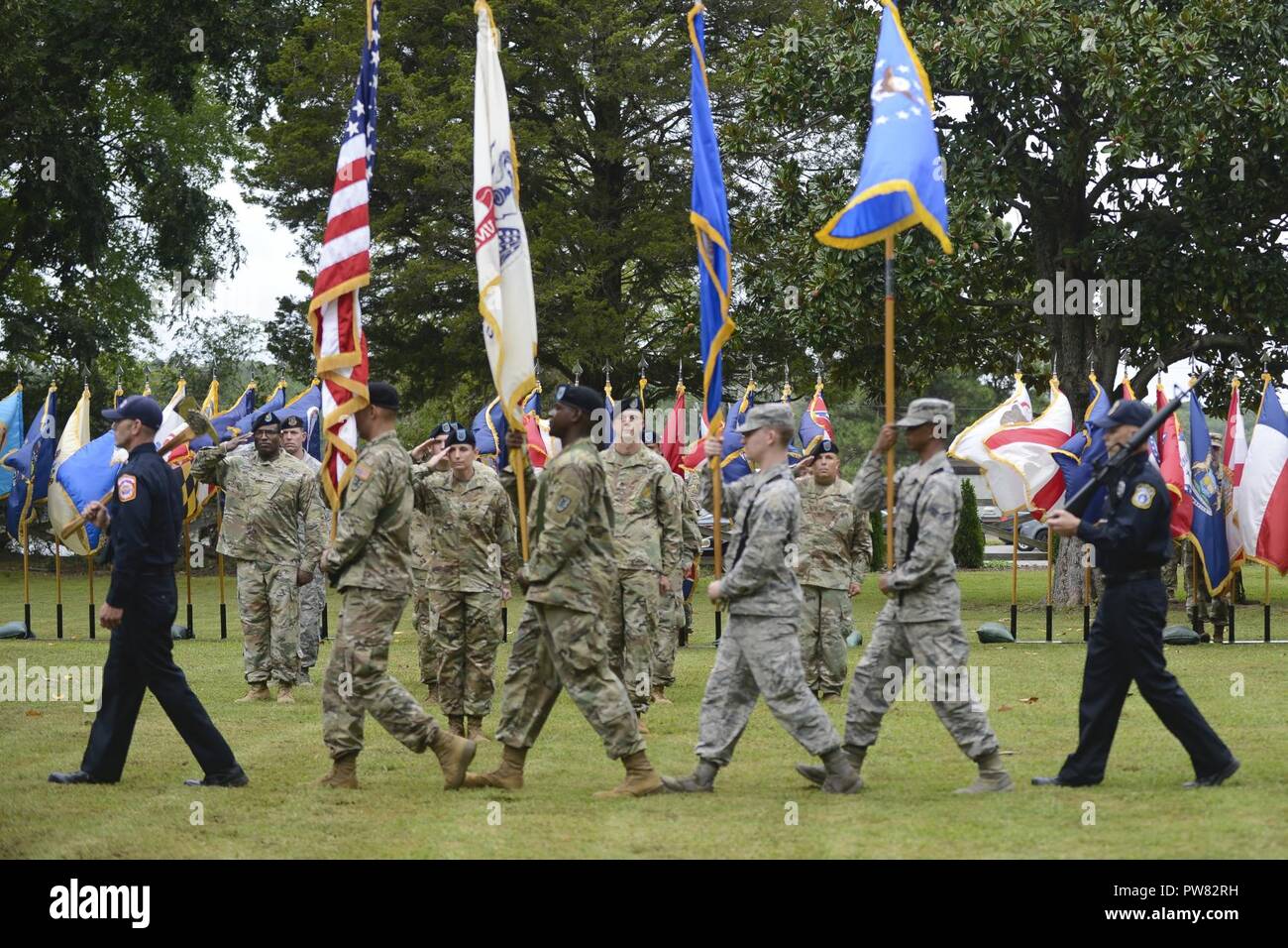 U.S. color guard members retire the colors, ending the 733rd Mission ...