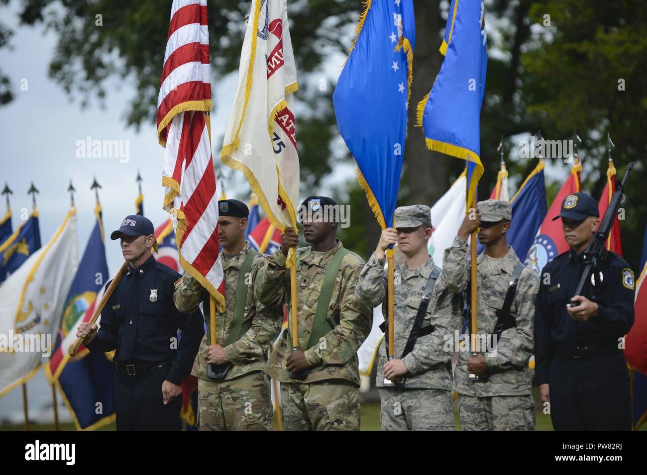 U.S. color guard members present the colors during the 733rd Mission ...
