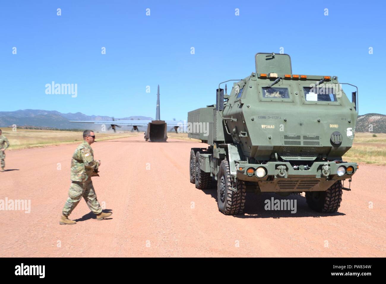 With engines running on the C-130 Hercules aircraft from the 41st ...
