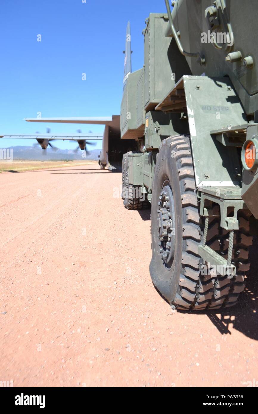 Suspension lowered and tires partially deflated through its central ...