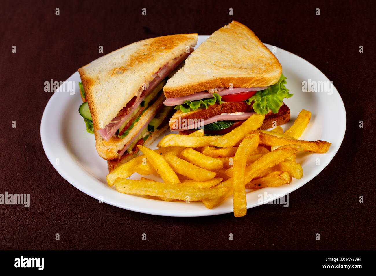 Club sandwich with ham and cheese Stock Photo - Alamy