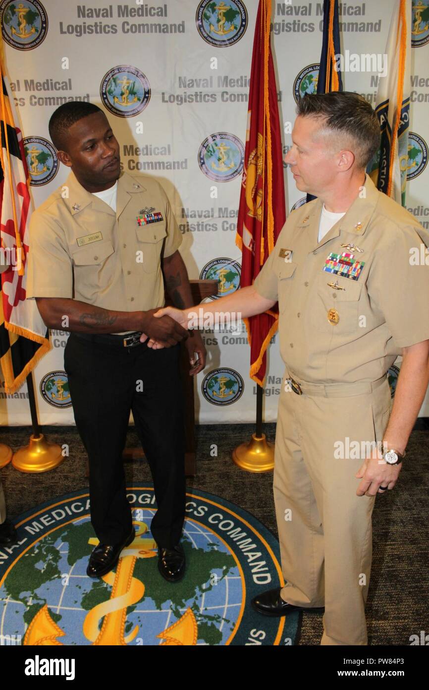 Command Master Chief Patrick West congratulates Logistics Specialists ...