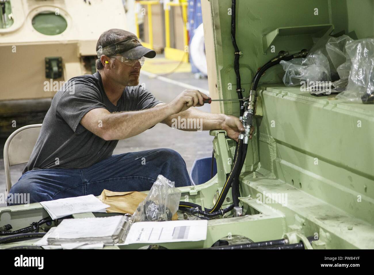 Joel Pettus assembles wiring components for a M113A3/MBT Main Battle ...