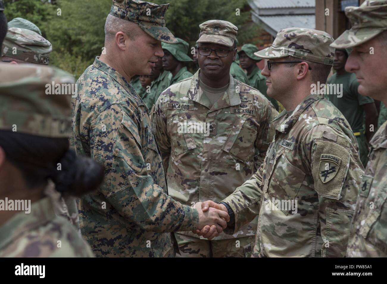 U.S. Marine Corps Brig. Gen. David Furness (left), commanding general ...