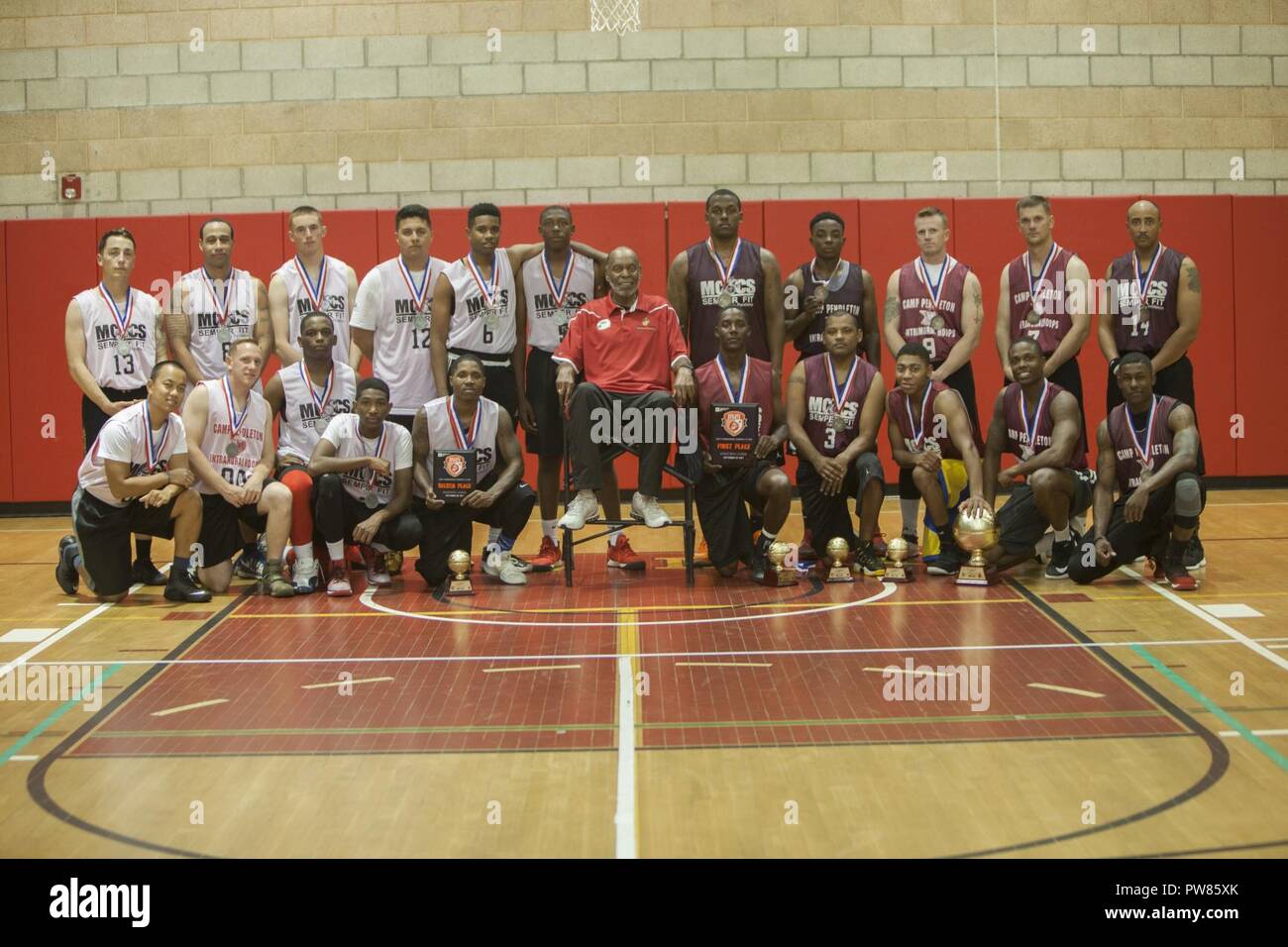 Retired Sgt. Maj. Chris Crawford, center, basketball and golf league ...