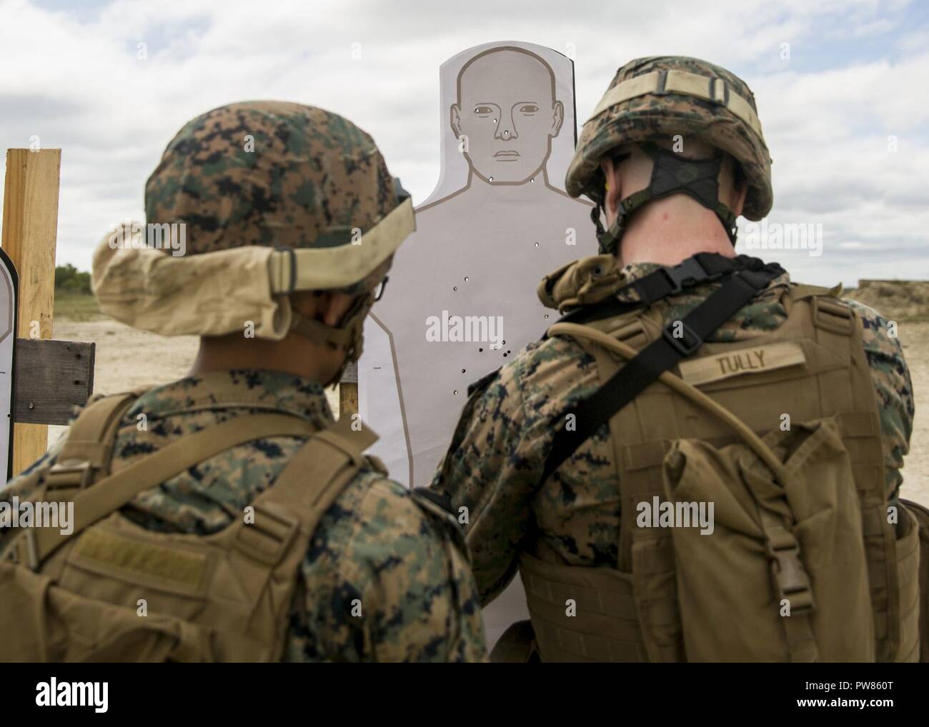 U.S. Marine Corps Cpl. John M. Tully, right, a low altitude air defense ...