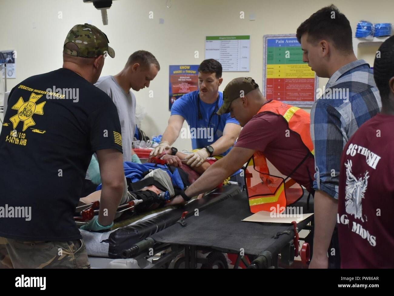 Capt. Nathaniel Turner, physician’s assistant, along with medics Spc ...