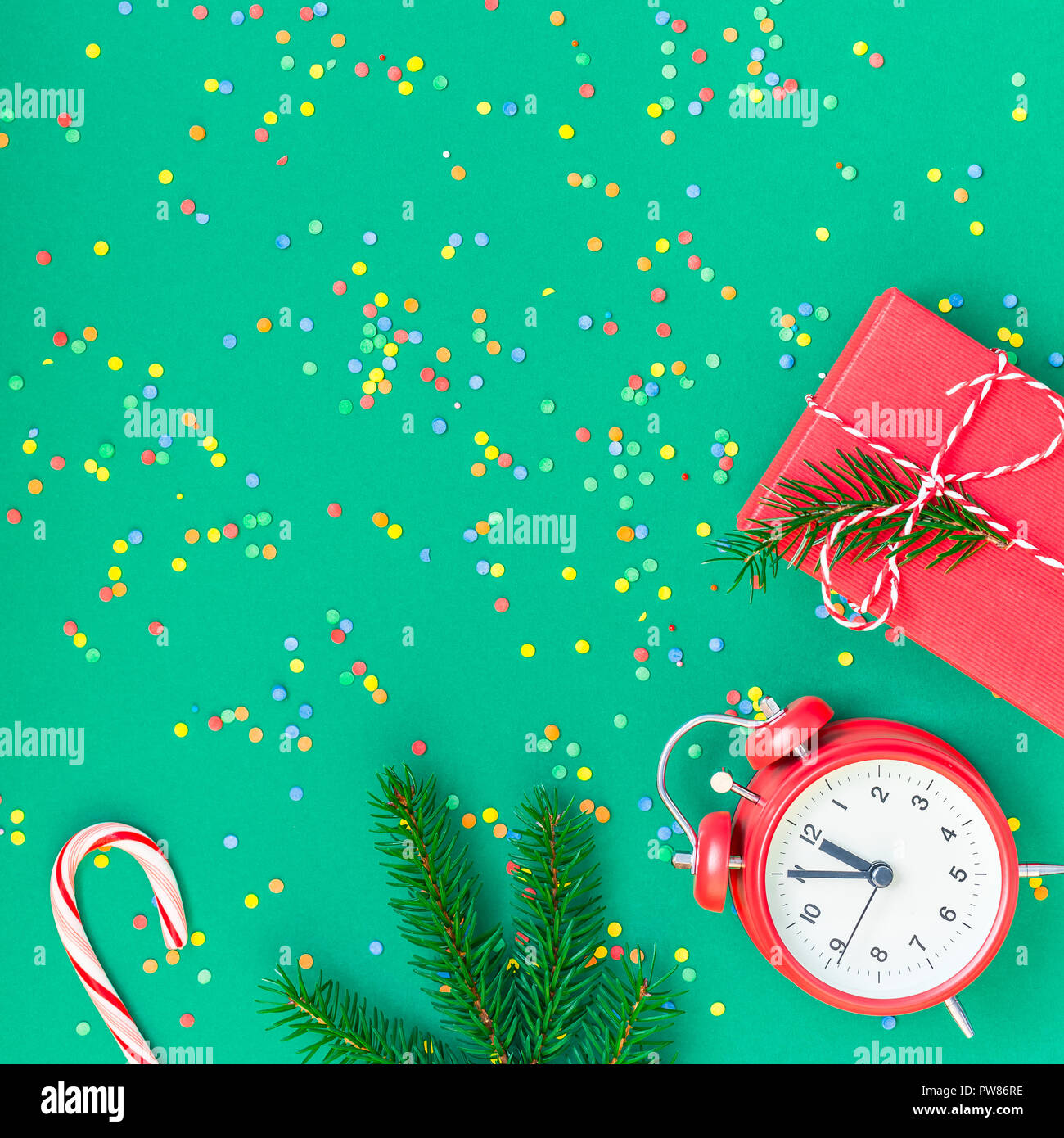 New Year or Christmas pattern flat lay top view with red alarm clock ...