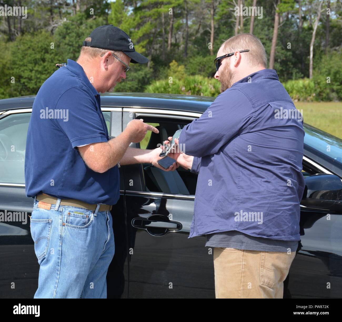 At left, Dr. Craig Rutland, Air Force Civil Engineer Center pavement ...