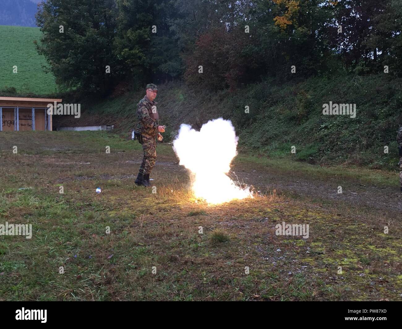 Swiss Army Sergeant Major Schneider provides a pyrotechnics ...