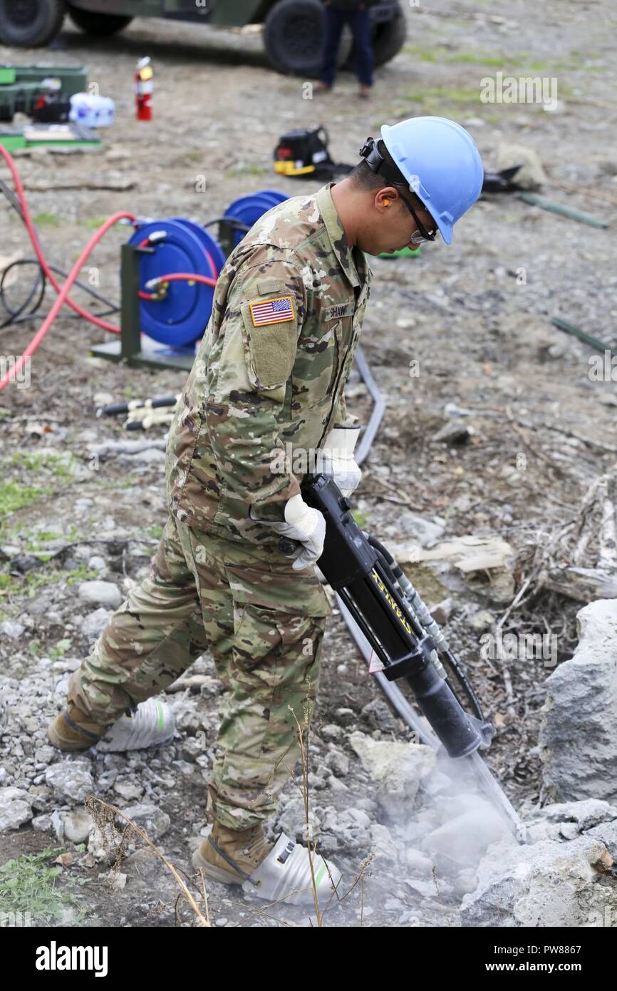 Alaska Army National Guard Sgt. Kin Shaw, a wheeled vehicle mechanic ...