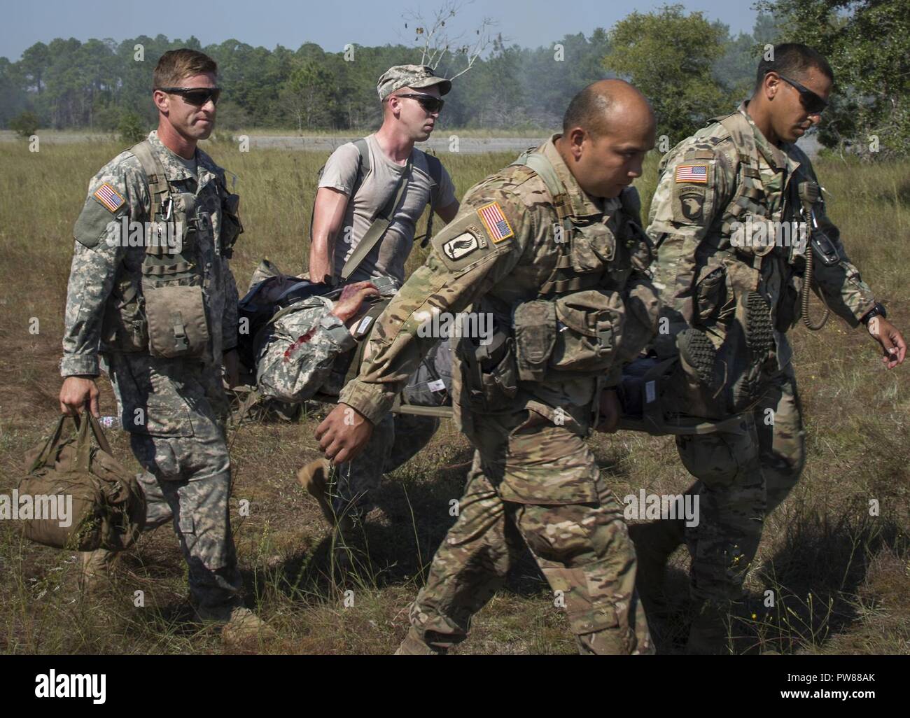 U.S. Army 6th Ranger Training Battalion members, carry a simulated ...