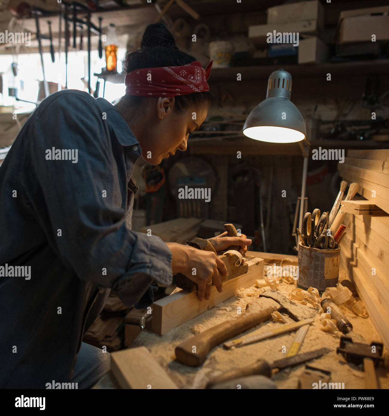 Handmade concept. Craftsman works in a wood workshop Stock Photo - Alamy
