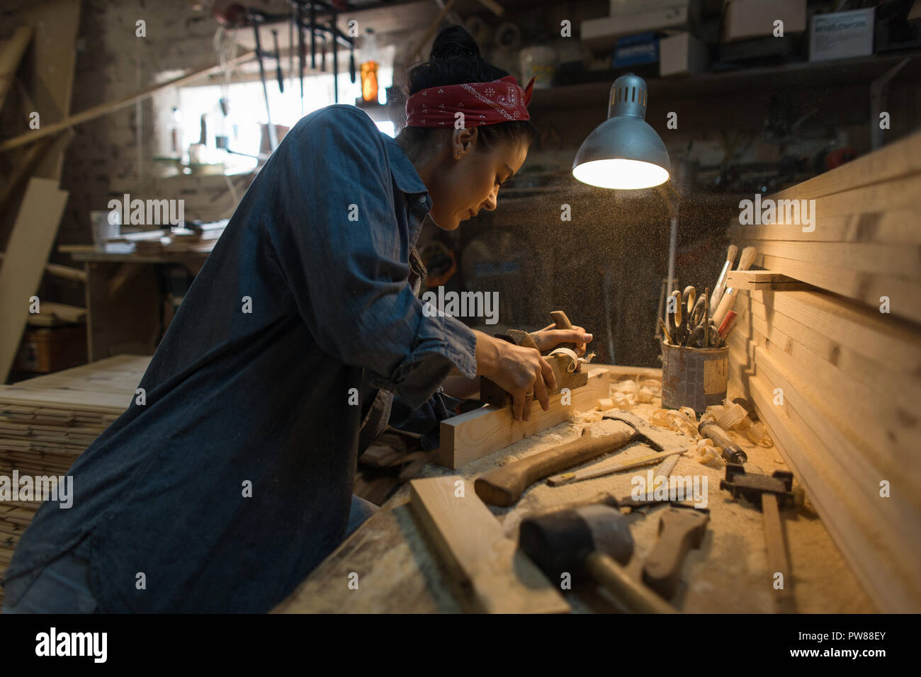 Girl works in workshop hi-res stock photography and images - Alamy