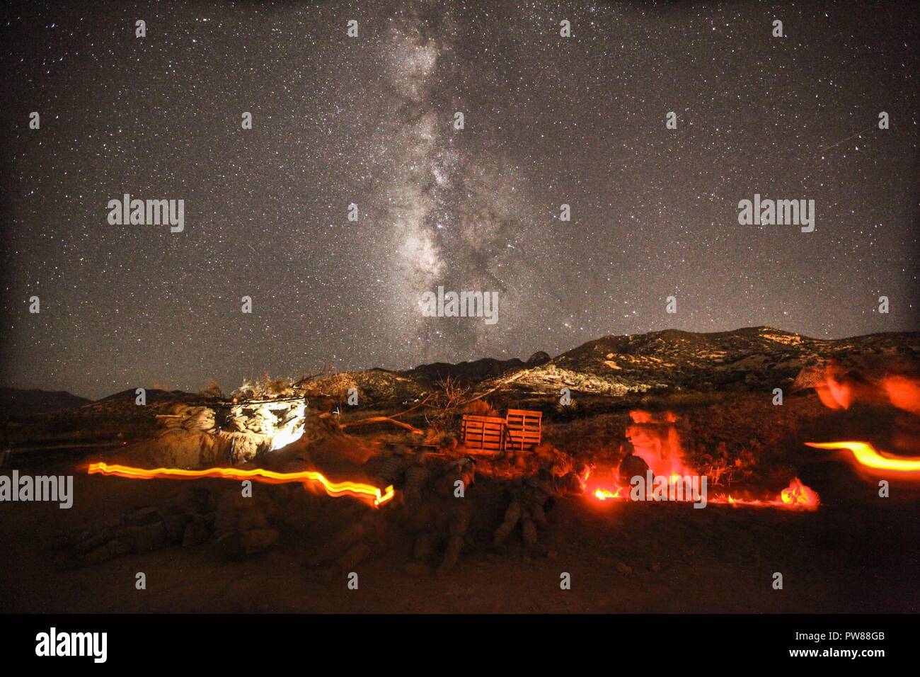 Alpha Company, 40th Expeditionary Signal Battalion conducts a live fire ...