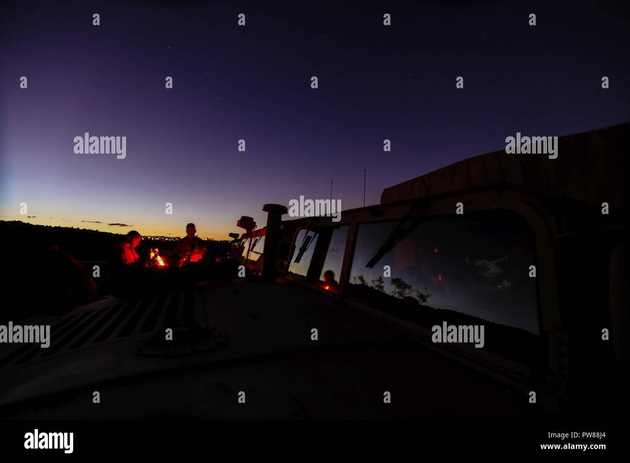 Alpha Company, 40th Expeditionary Signal Battalion conducts a live fire ...