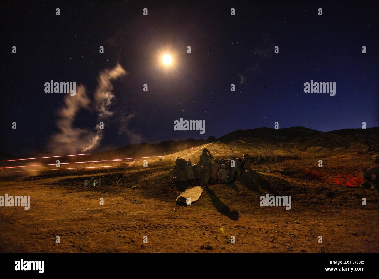 Alpha Company, 40th Expeditionary Signal Battalion conducts a live fire ...