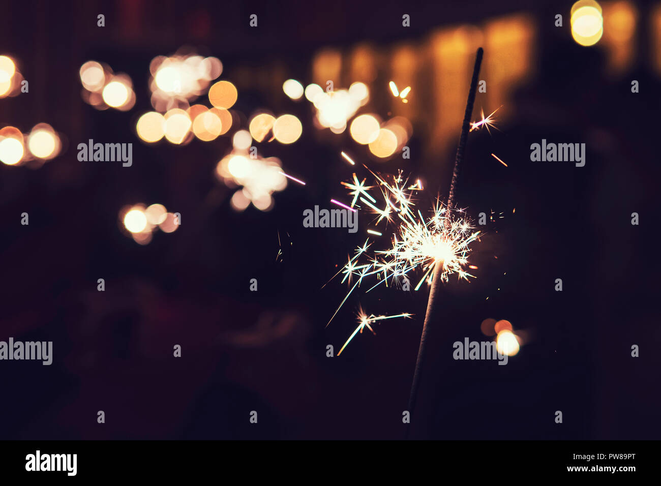 Beautiful sparkler firework flame on black background. Bright bengal ...