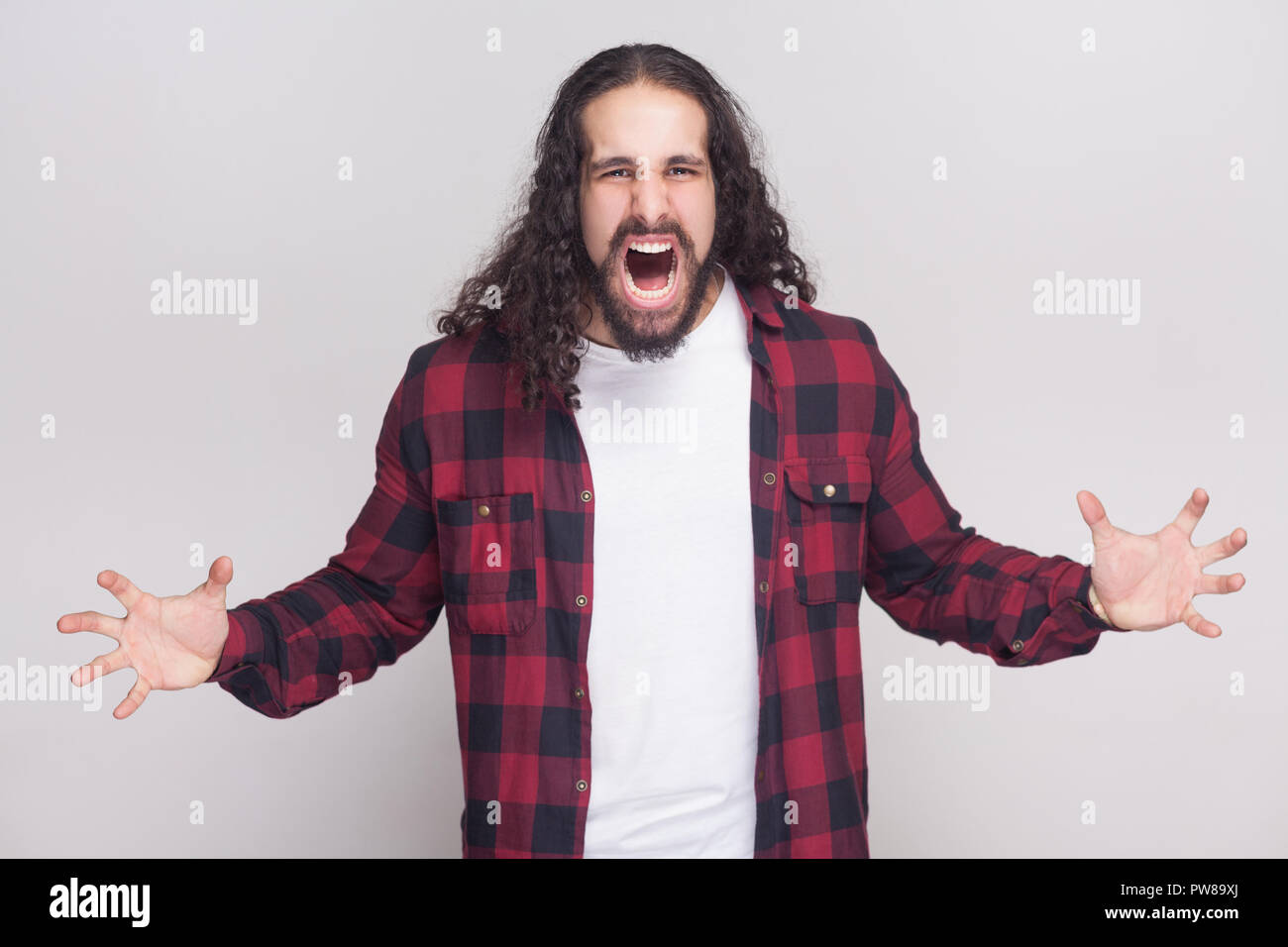 Angry mad man long hair hi-res stock photography and images - Alamy