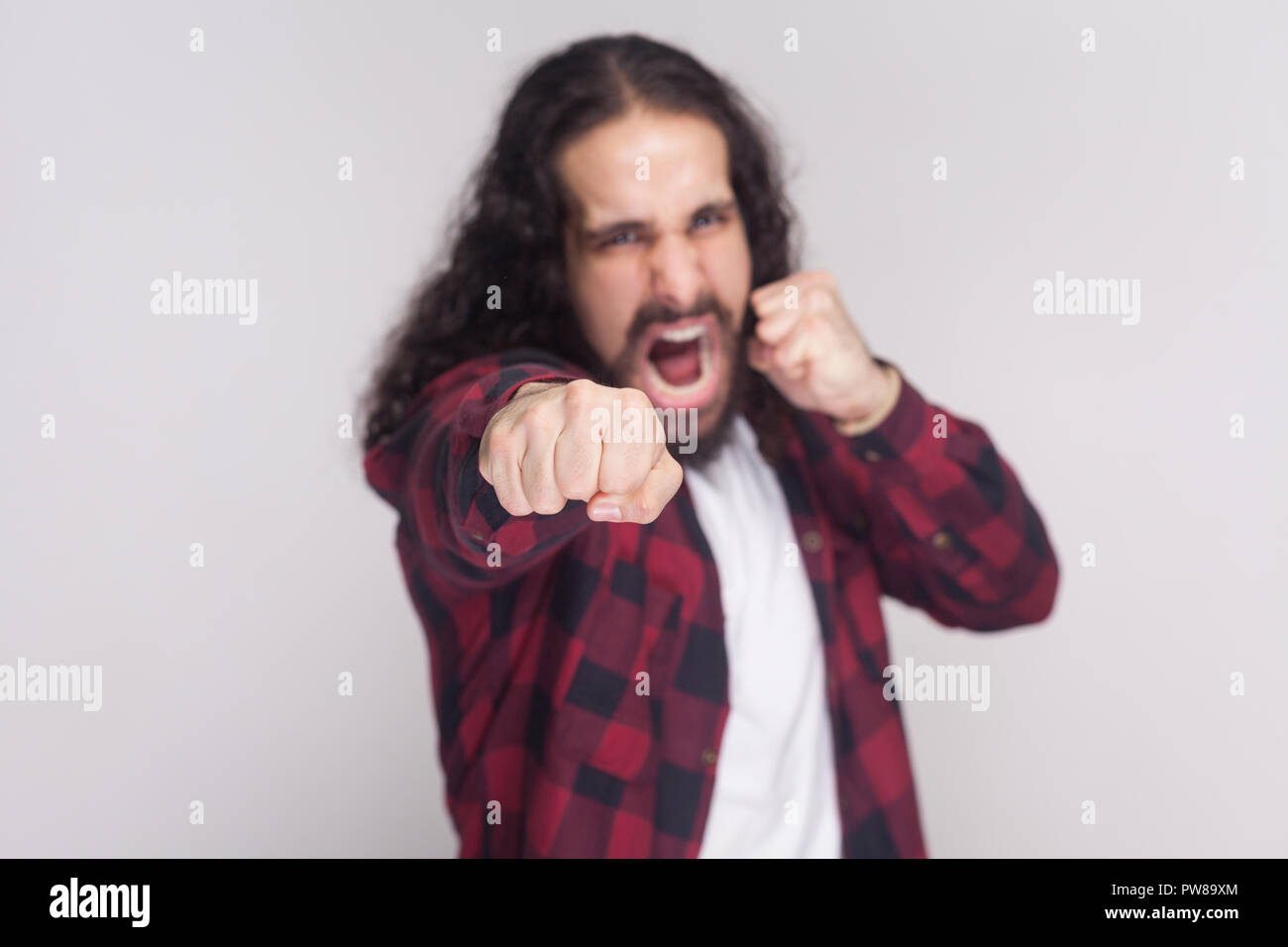 Angry mad man long hair hi-res stock photography and images - Alamy
