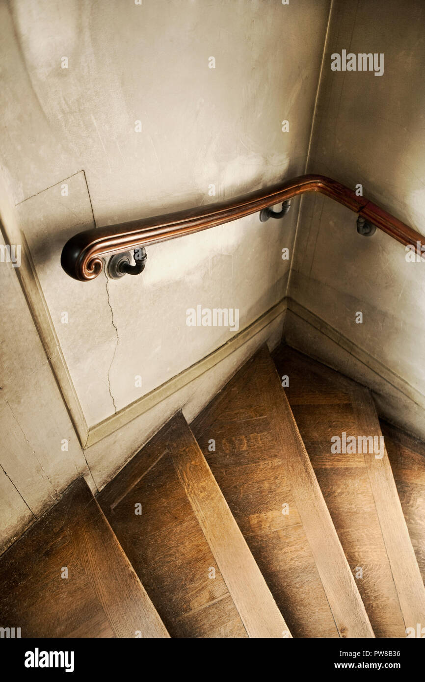 Wooden steps and banister in a weathered French mansion Stock Photo - Alamy