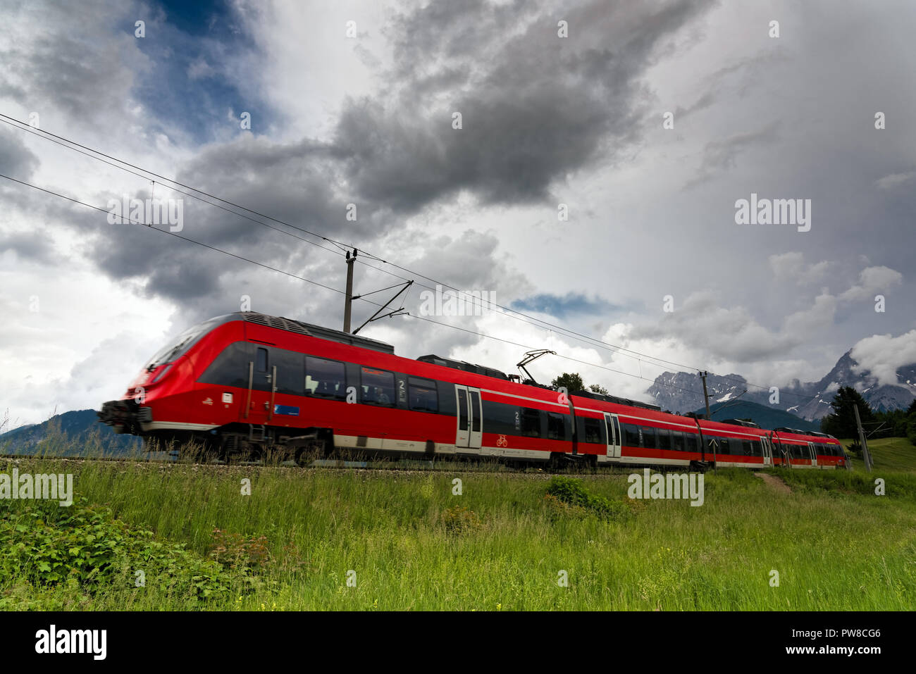 Red train in the german alps hi-res stock photography and images - Alamy