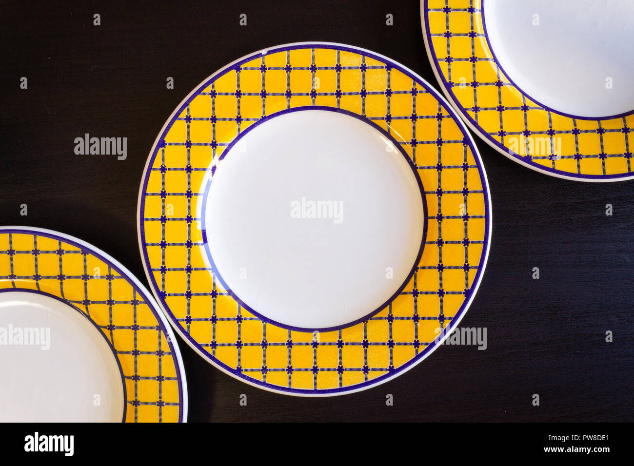 Three empty plates hi-res stock photography and images - Alamy