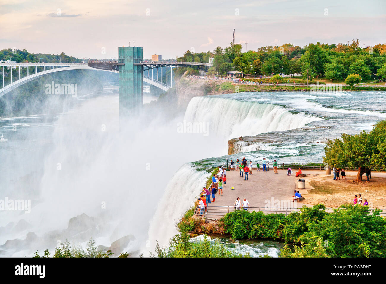 NIAGARA FALLS, USA - AUG 26, 2012: Tourists on the waterfall ...