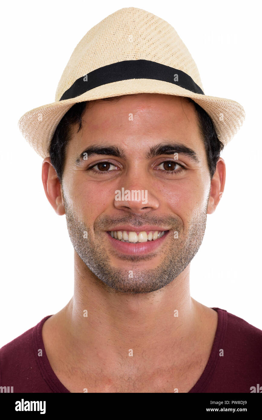 Face of young happy Hispanic man smiling Stock Photo - Alamy