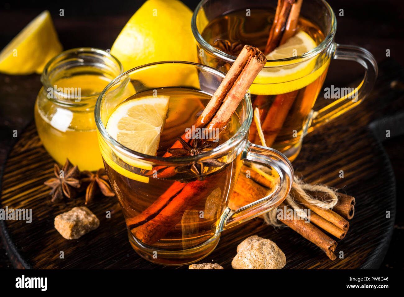 Autumn hot tea with lemon and spices Stock Photo - Alamy