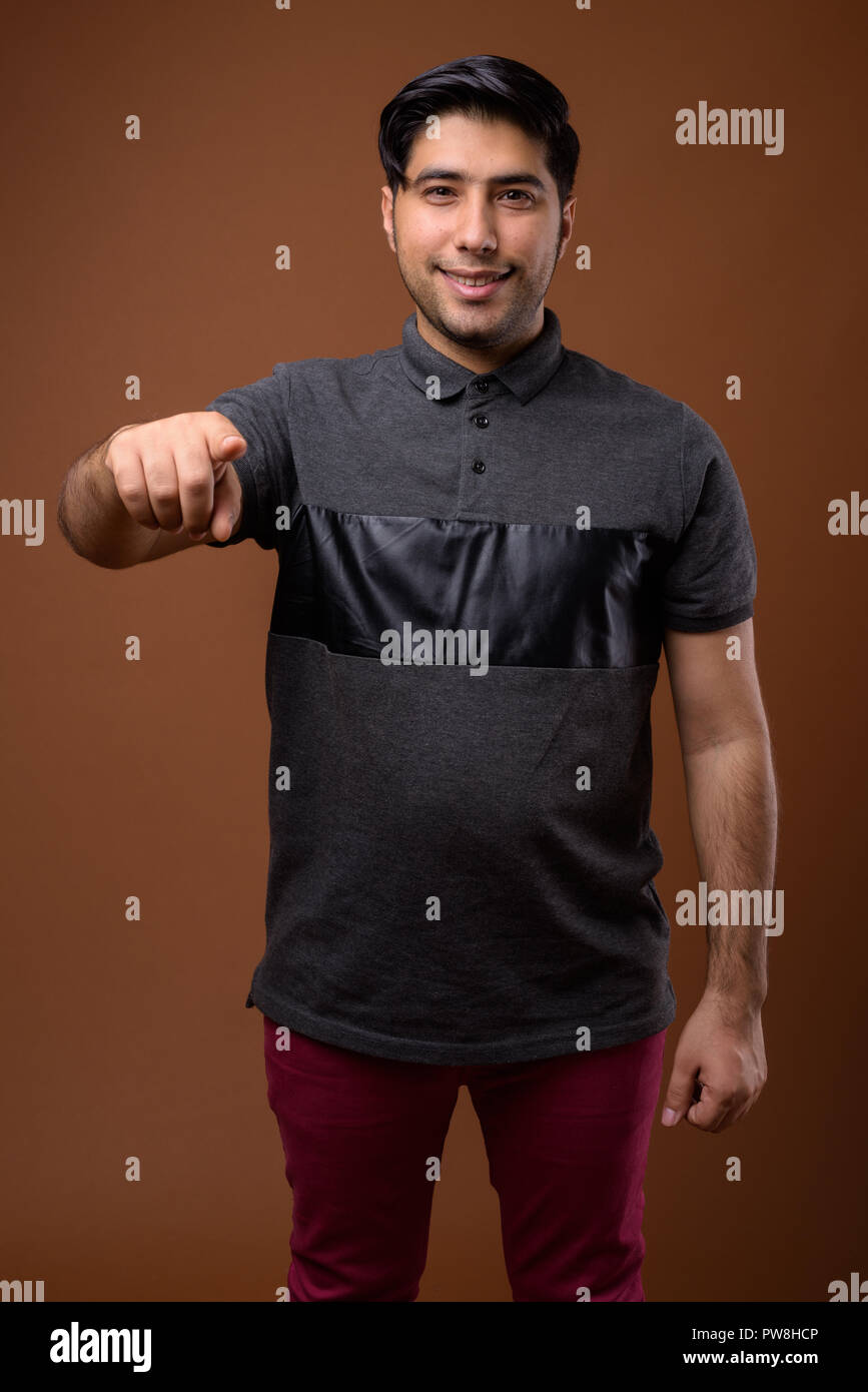 Happy persian man smiling against hi-res stock photography and images ...