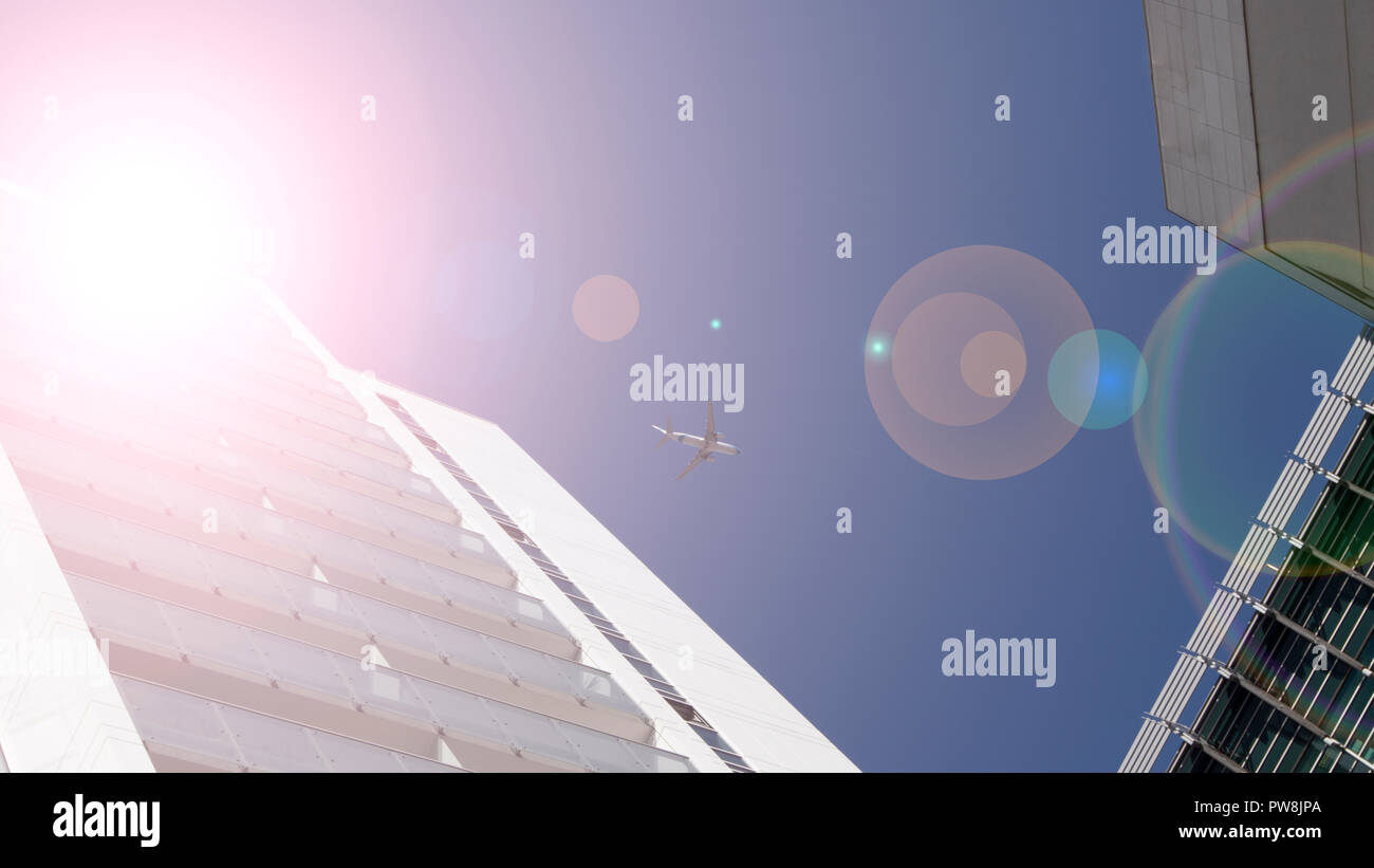 Airplane between buildings hi-res stock photography and images - Alamy