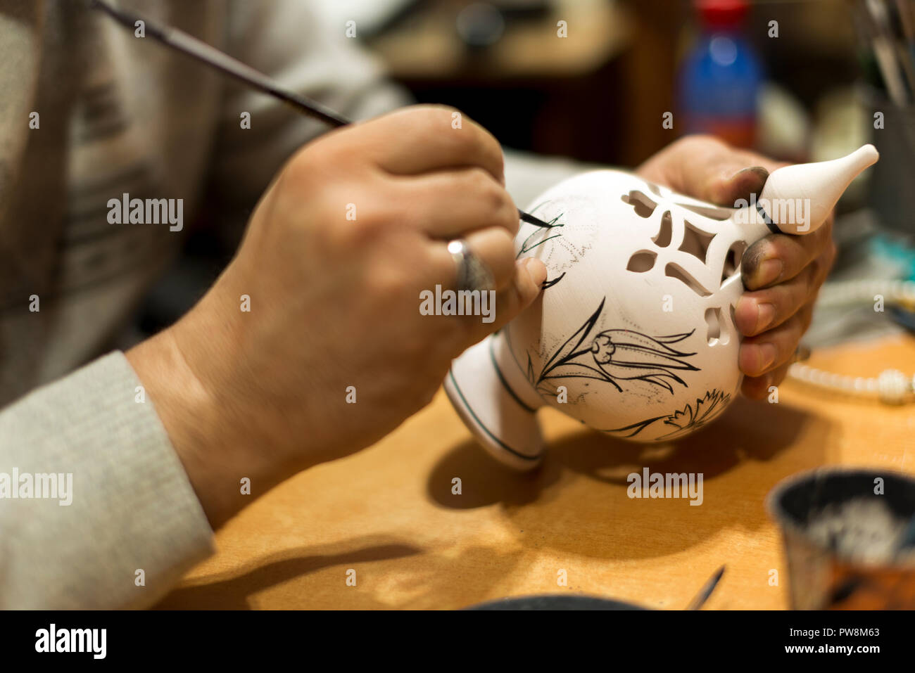 Handcraft product painting ceramic in the shop Stock Photo - Alamy